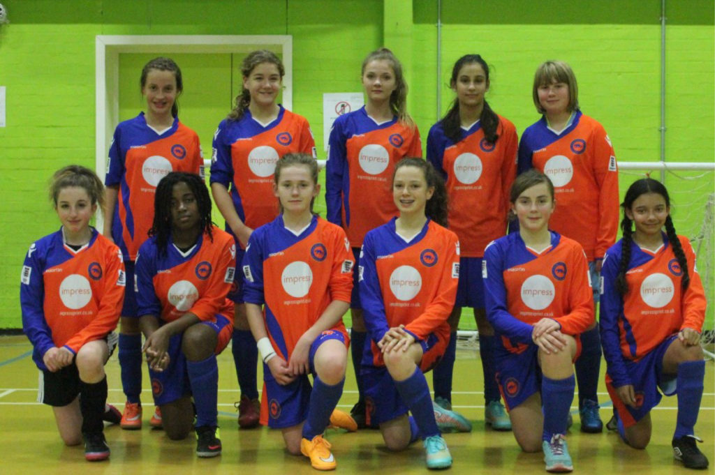 Impress Print Services sponsor new kit for girls football team